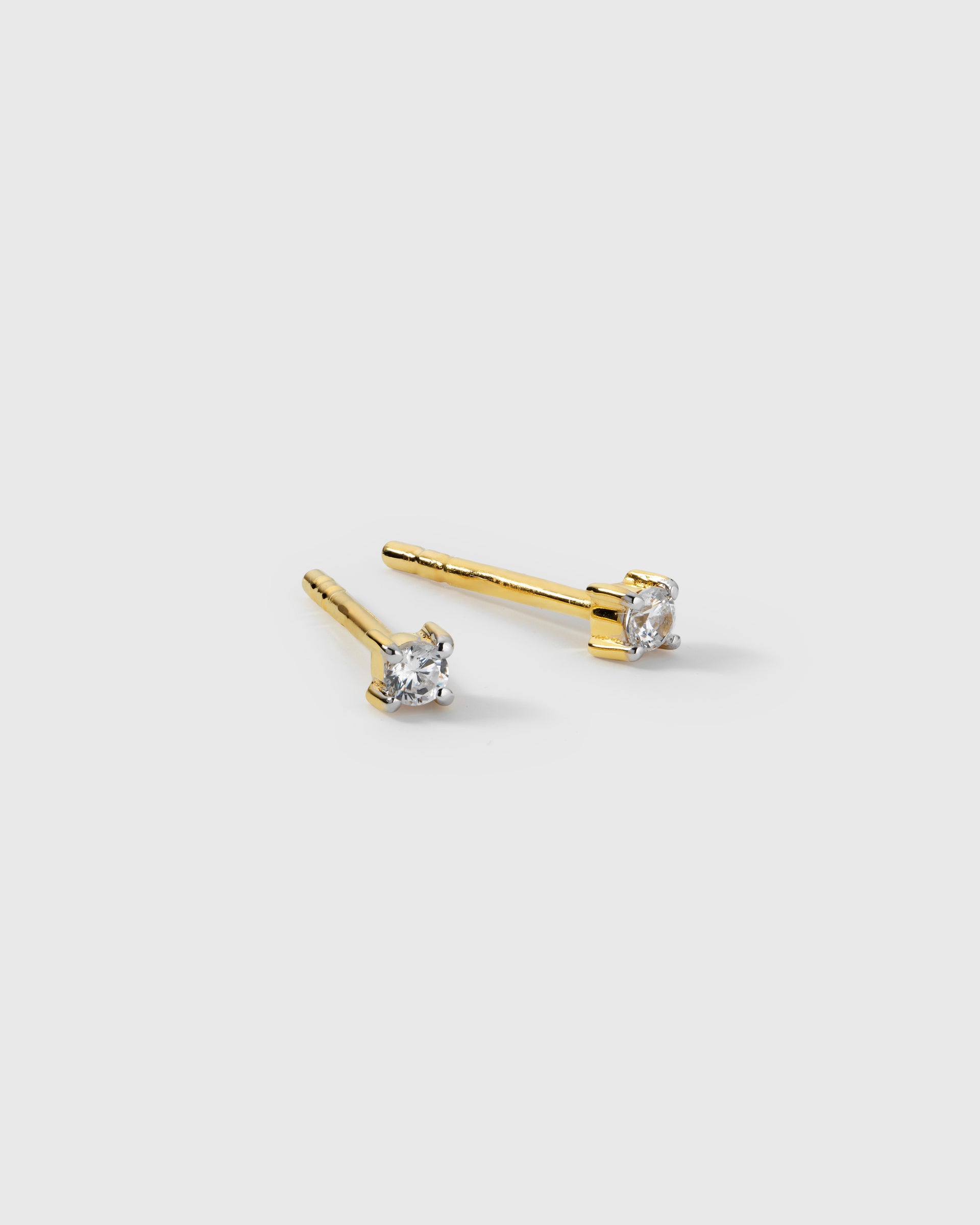 Celestia Mini Studs Gold - Cubic zirconia mini stud earrings from Syster P